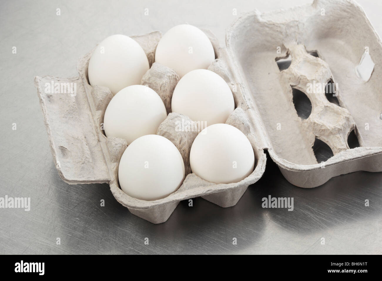 Six eggs in carton on hi-res stock photography and images - Alamy