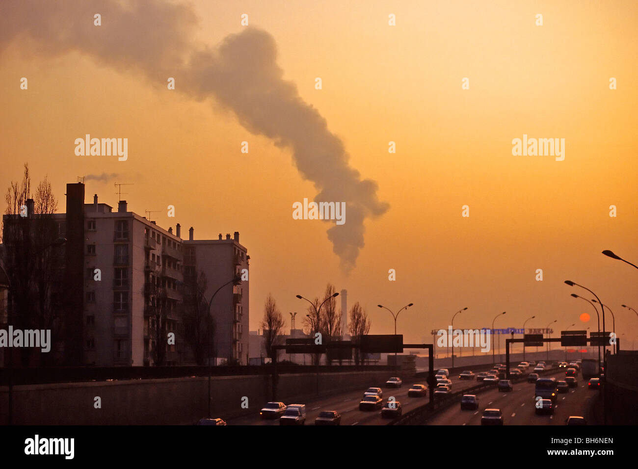 URBAN POLLUTION, FACTORY SMOKE AND CARS ON THE RING ROAD, PARIS (75 ...
