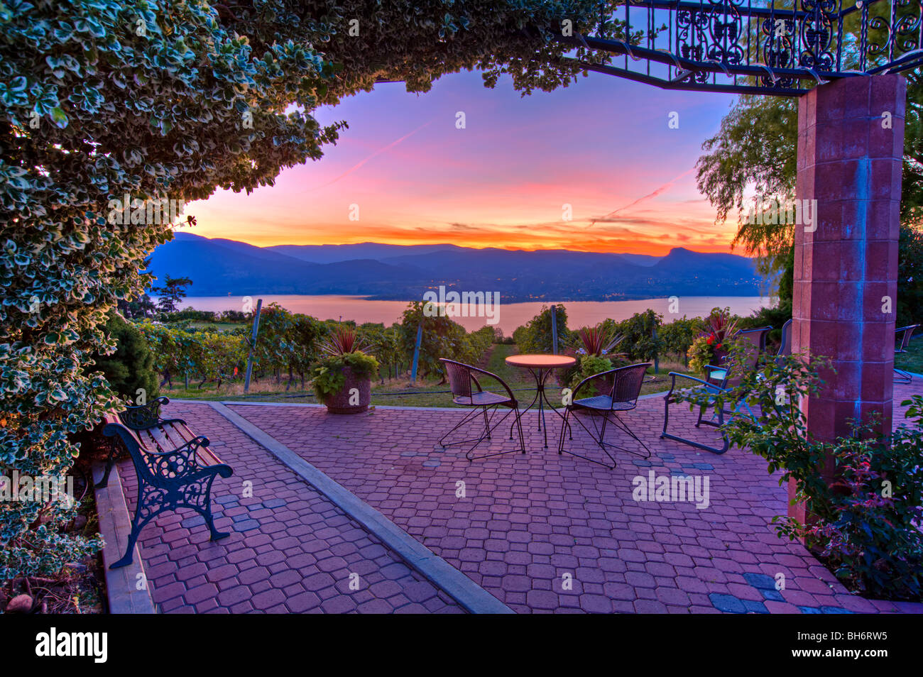 Sunset over Okanagan Lake viewed from the patio at Lang Vineyards ...