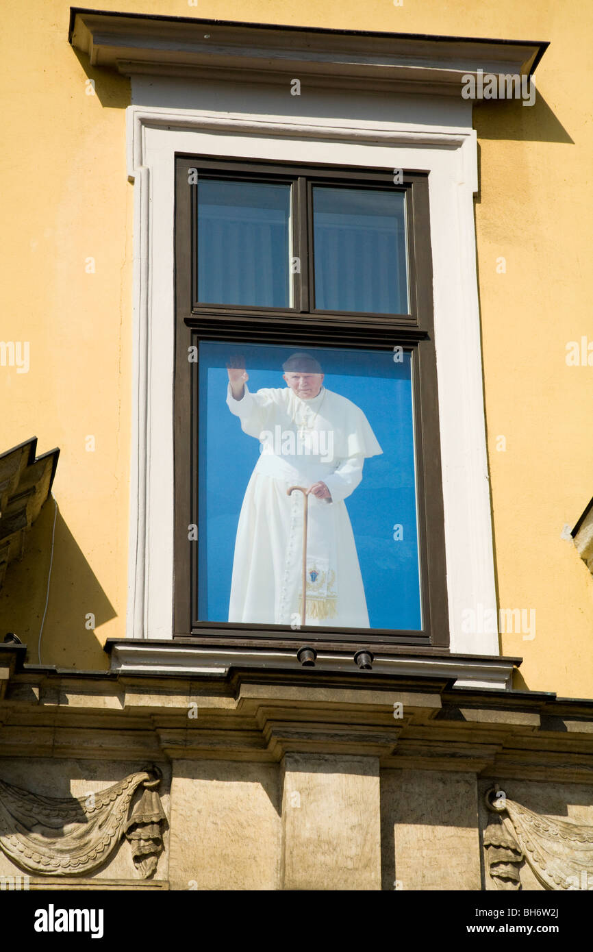 Photographic image of Pope John - Paul II on display in a window of the ...