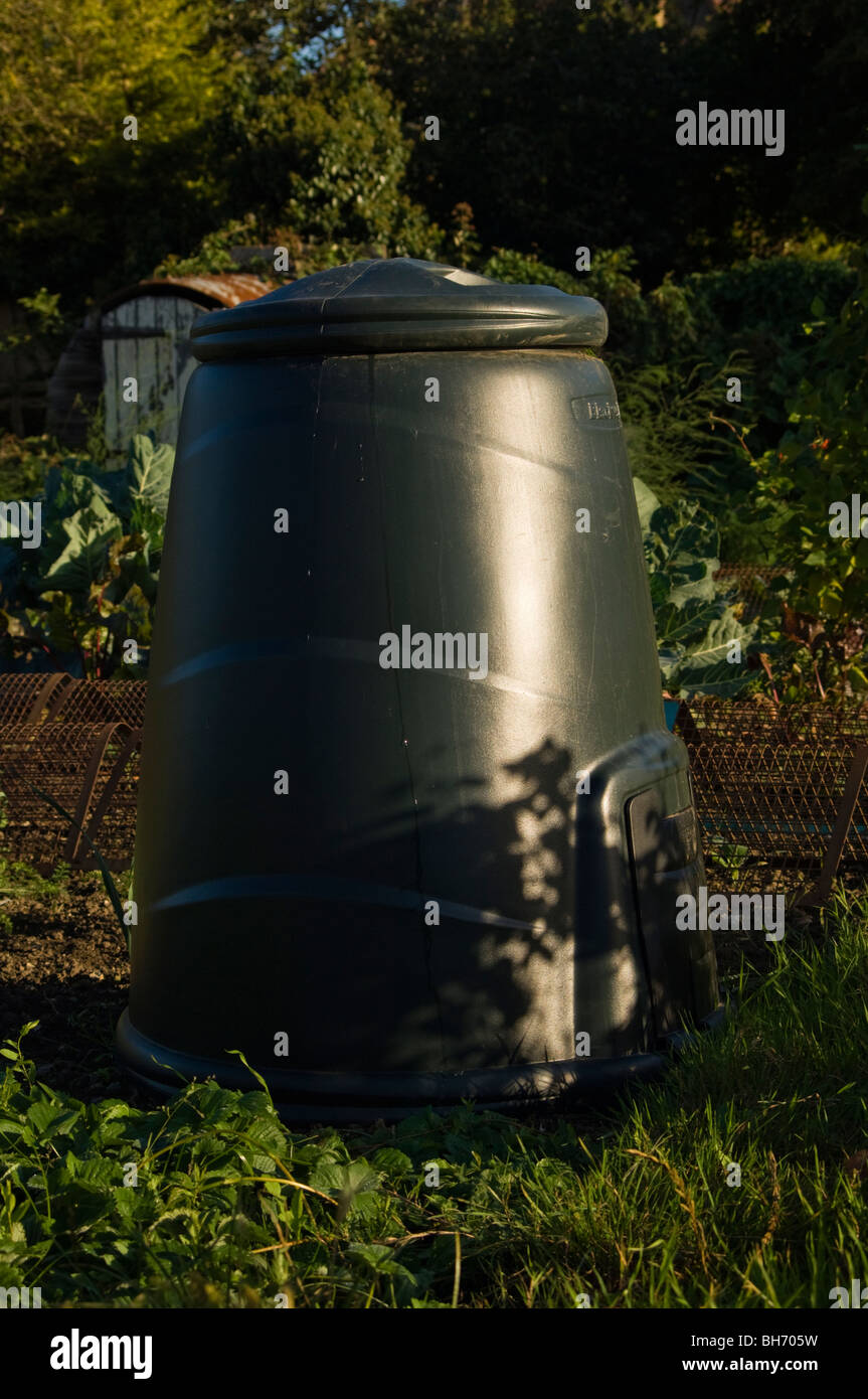Plastic compost bin on an allotment plot Stock Photo - Alamy