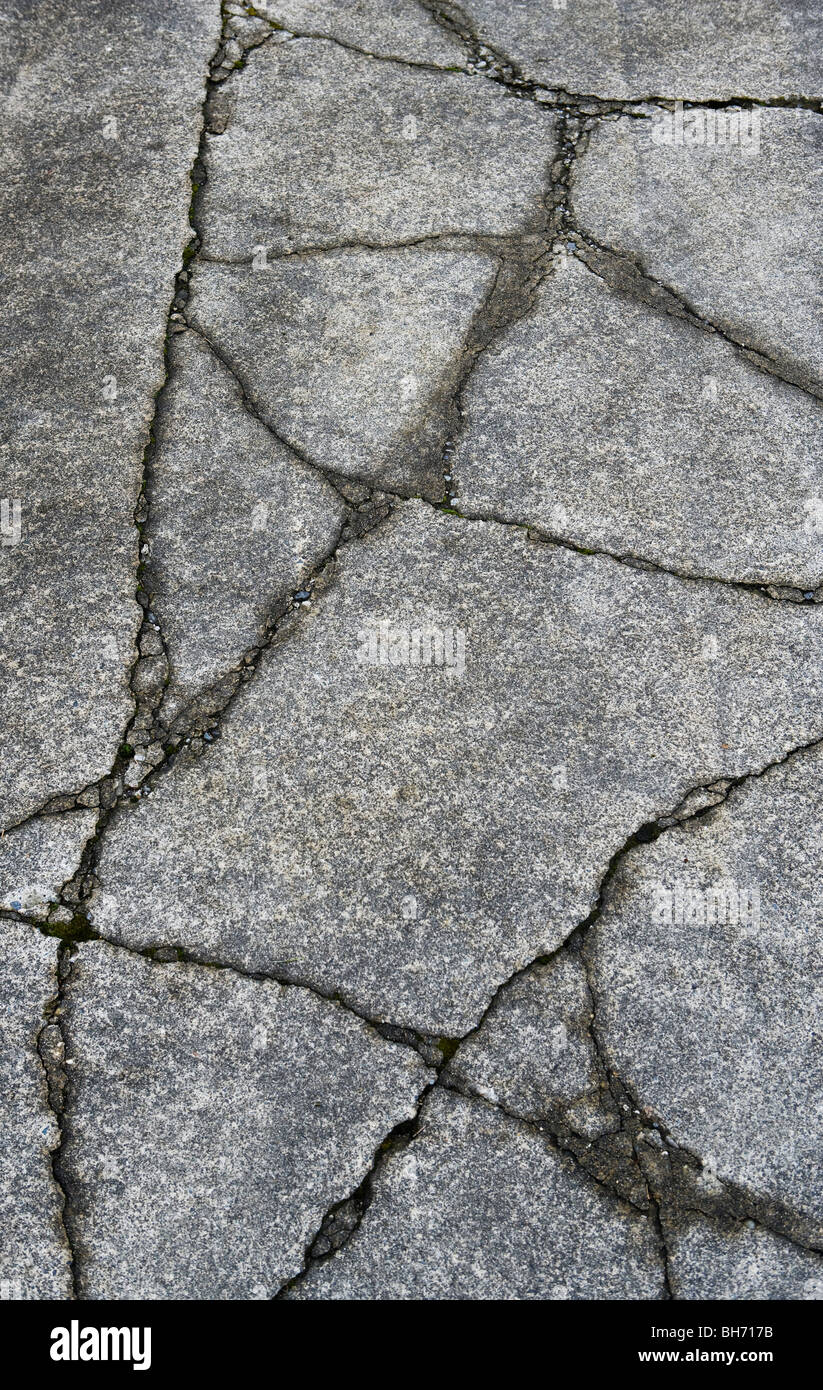 Cracks in concrete pavement Stock Photo - Alamy