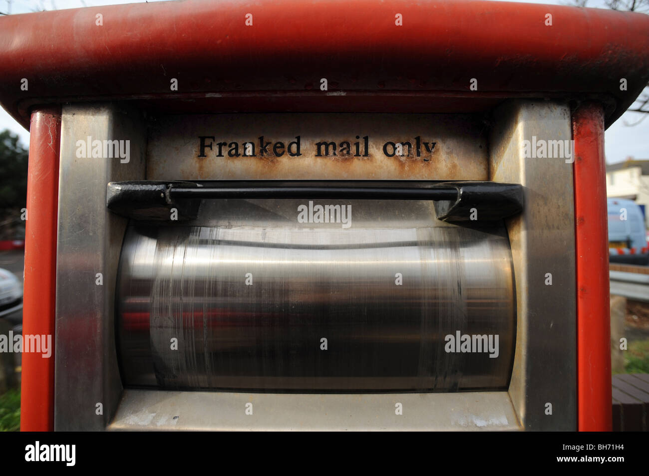 A royal mail red post box for franked mail only Stock Photo - Alamy