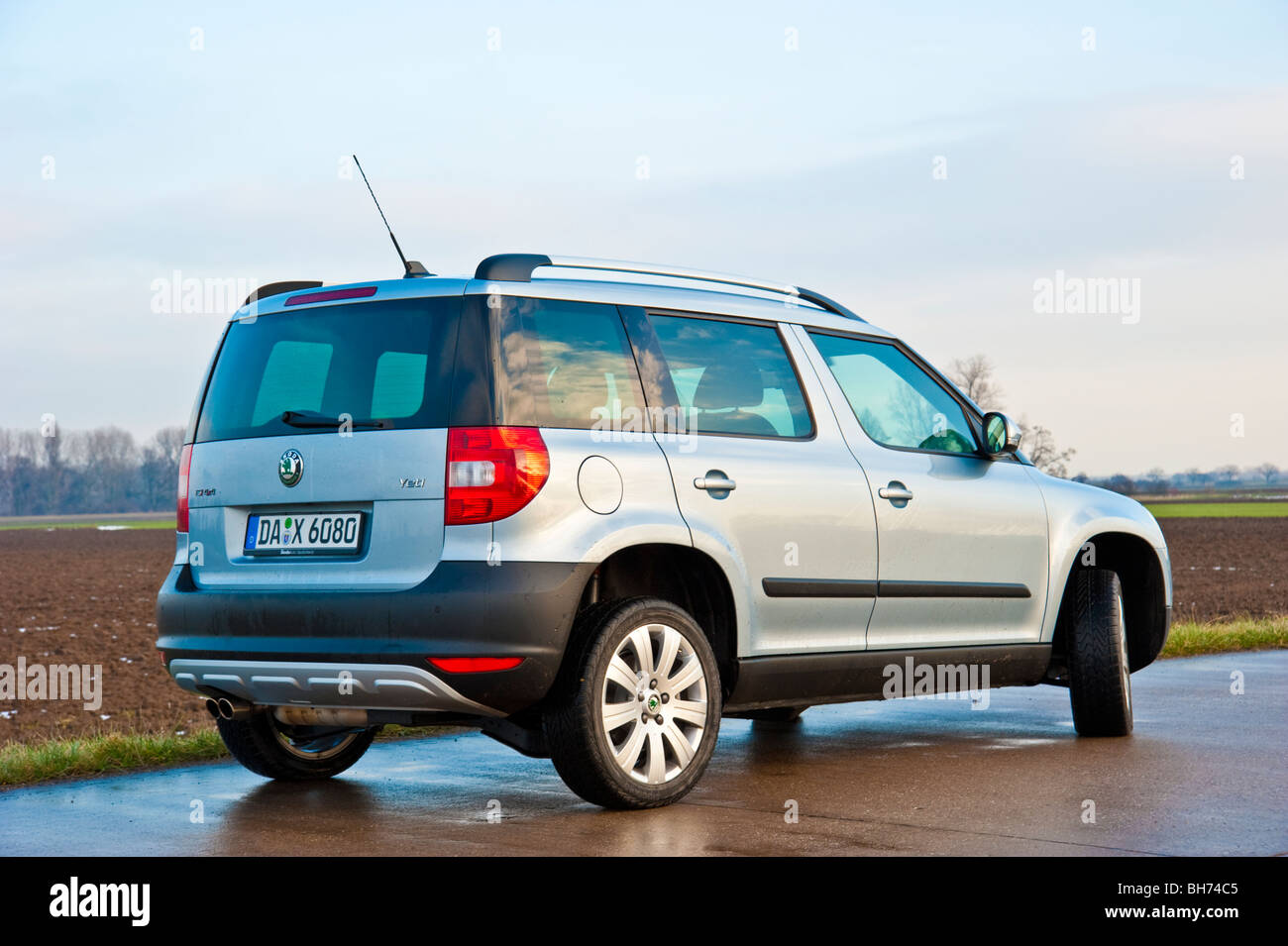 Rear, side view Skoda Yeti SUV, 2010 model in light blue metallic ...