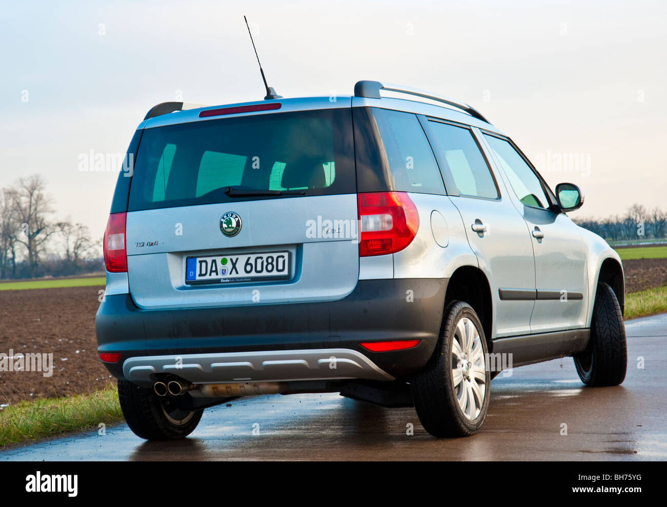 Rear, side view Skoda Yeti SUV, 2010 model in light blue metallic ...