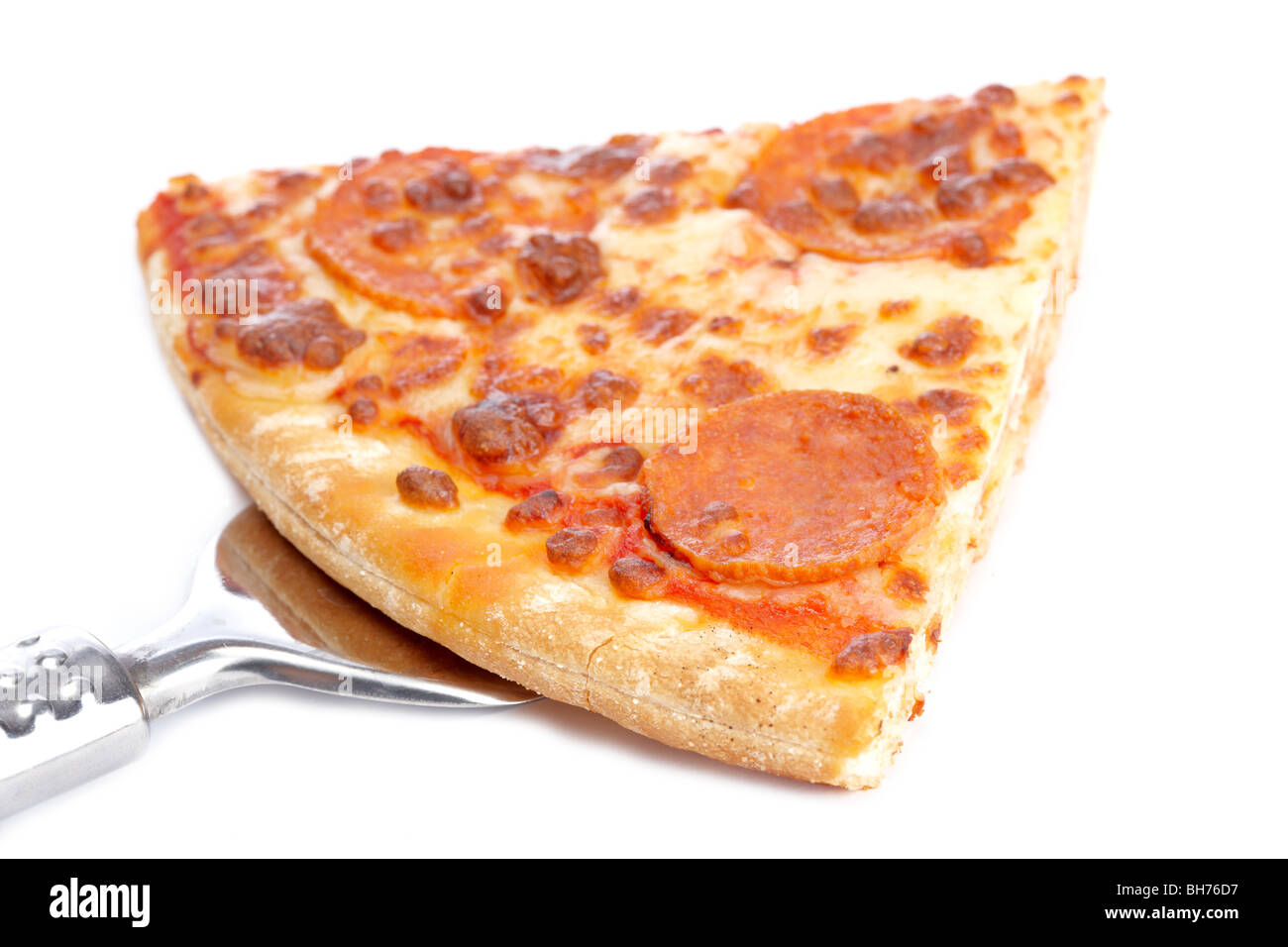 Slice of tasty Italian pizza with soft shadow on a white background ...