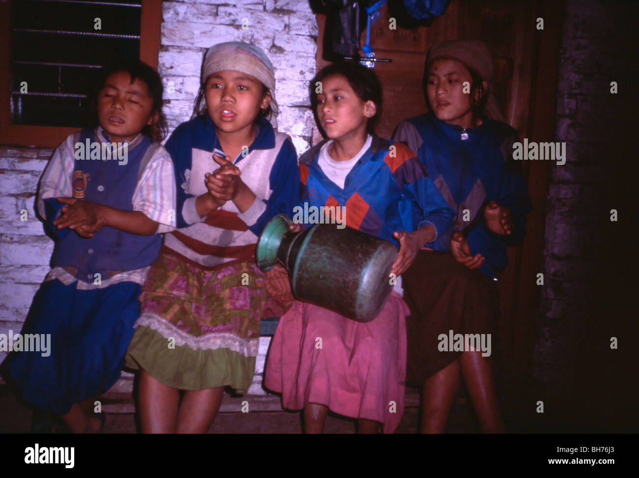Nepalese children playing and singing Stock Photo - Alamy