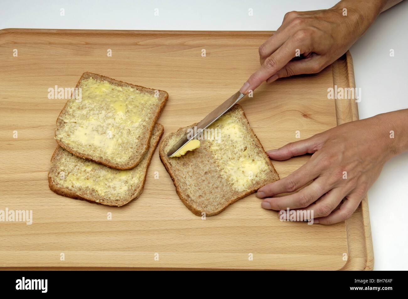 Buttering Bread Stock Photos & Buttering Bread Stock Images - Alamy