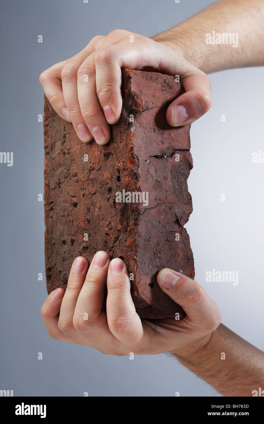 Hand grip brick hi-res stock photography and images - Alamy