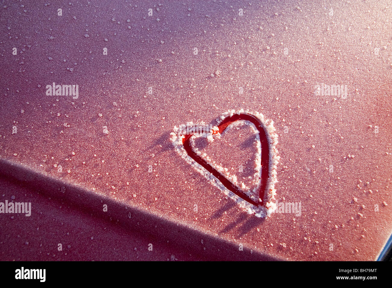 Heart shape drawing in frost on a car bonnet Stock Photo - Alamy