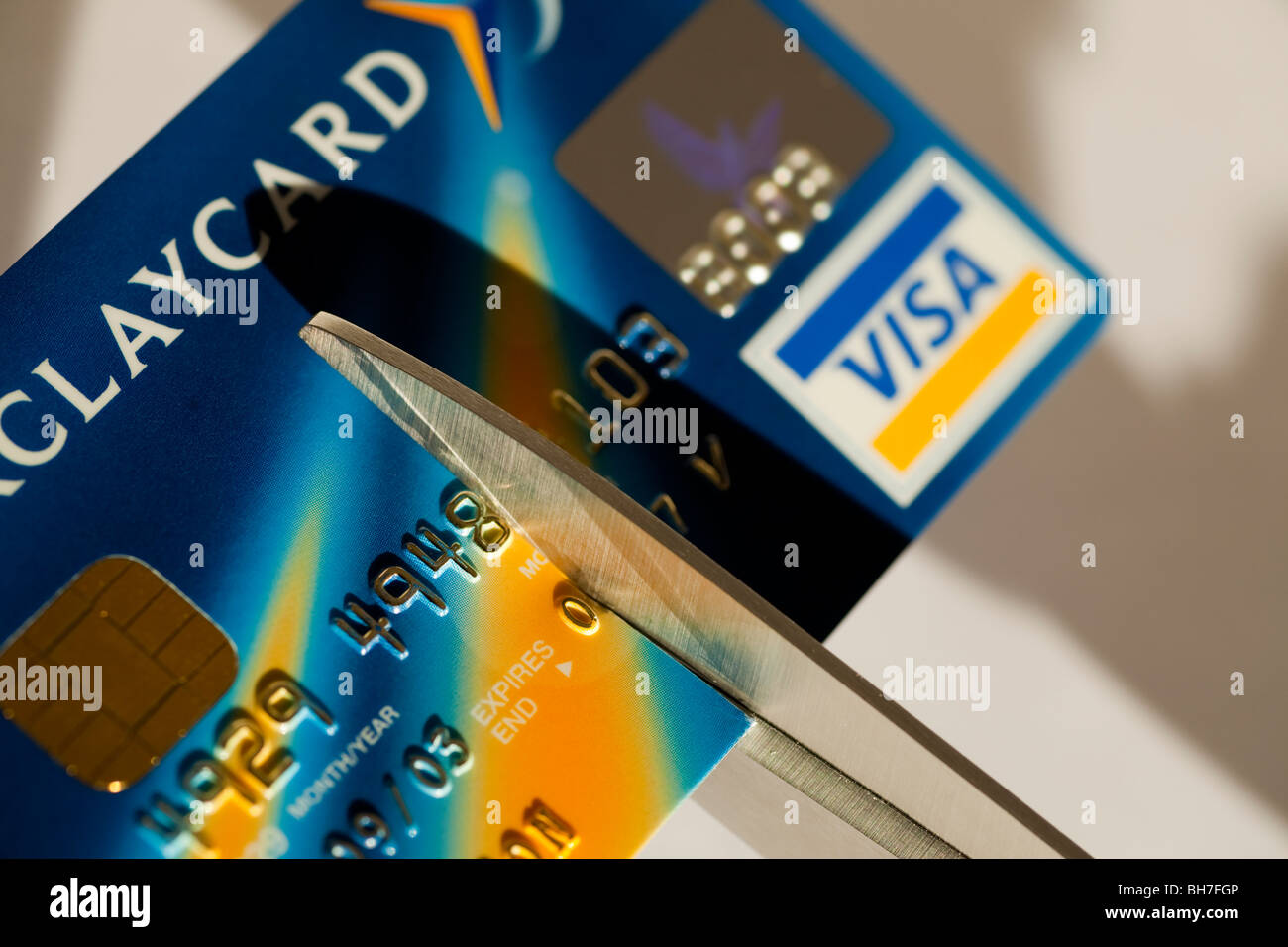 credit card being cut Stock Photo - Alamy