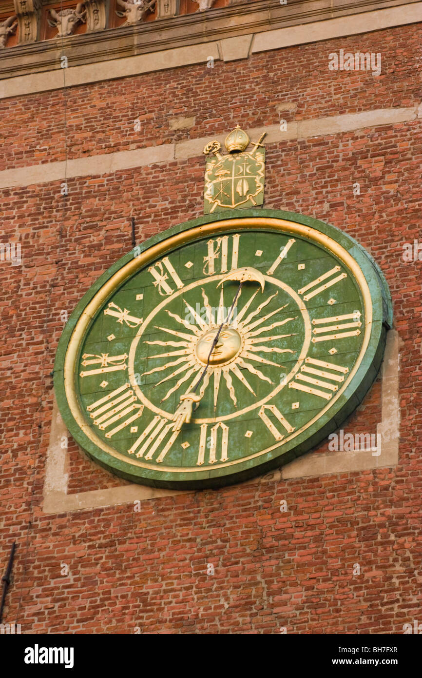 wawel clock face in brickwork in krakow Stock Photo - Alamy