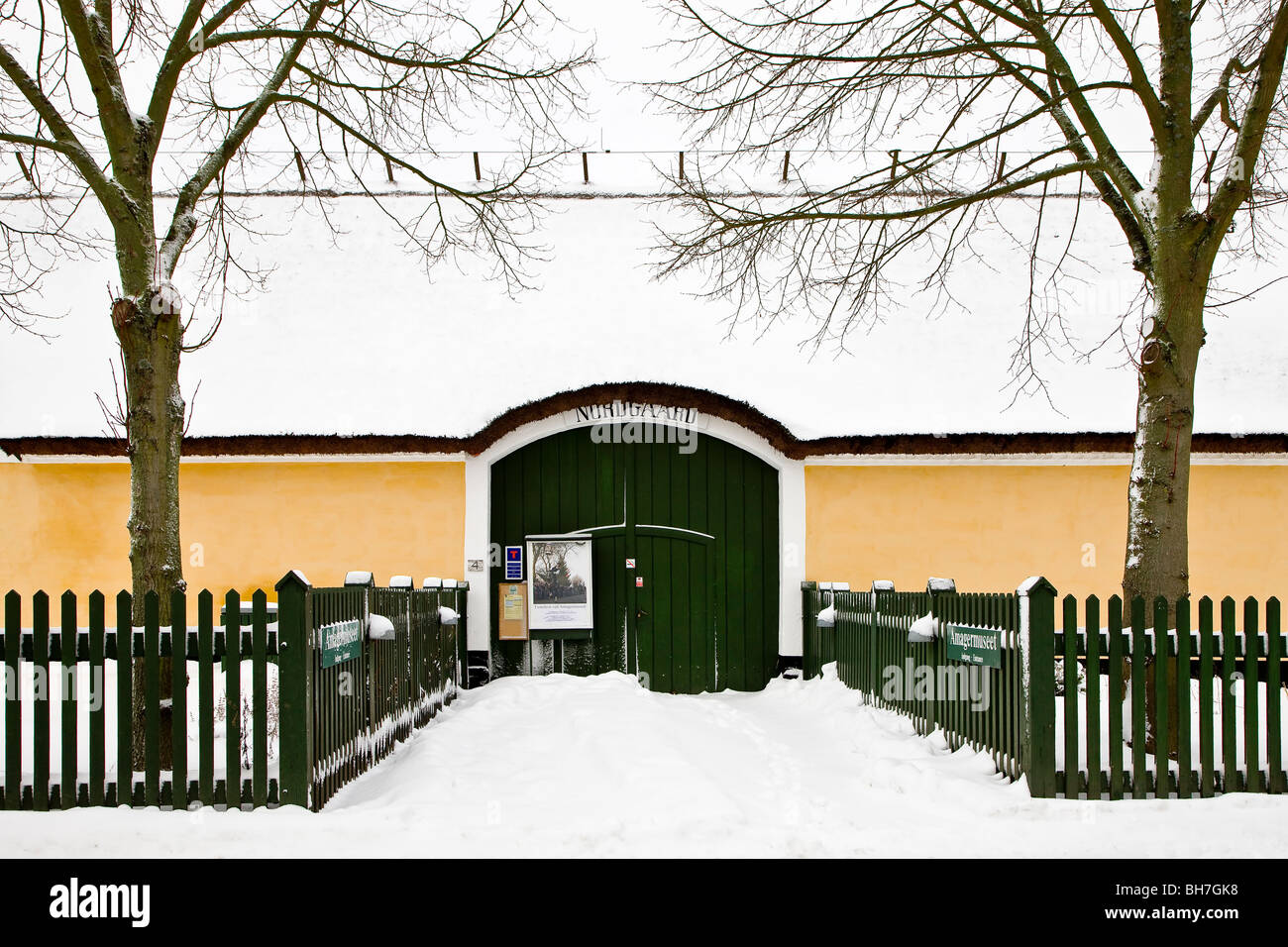 Snow covered entrance to the local village museum Stock Photo - Alamy