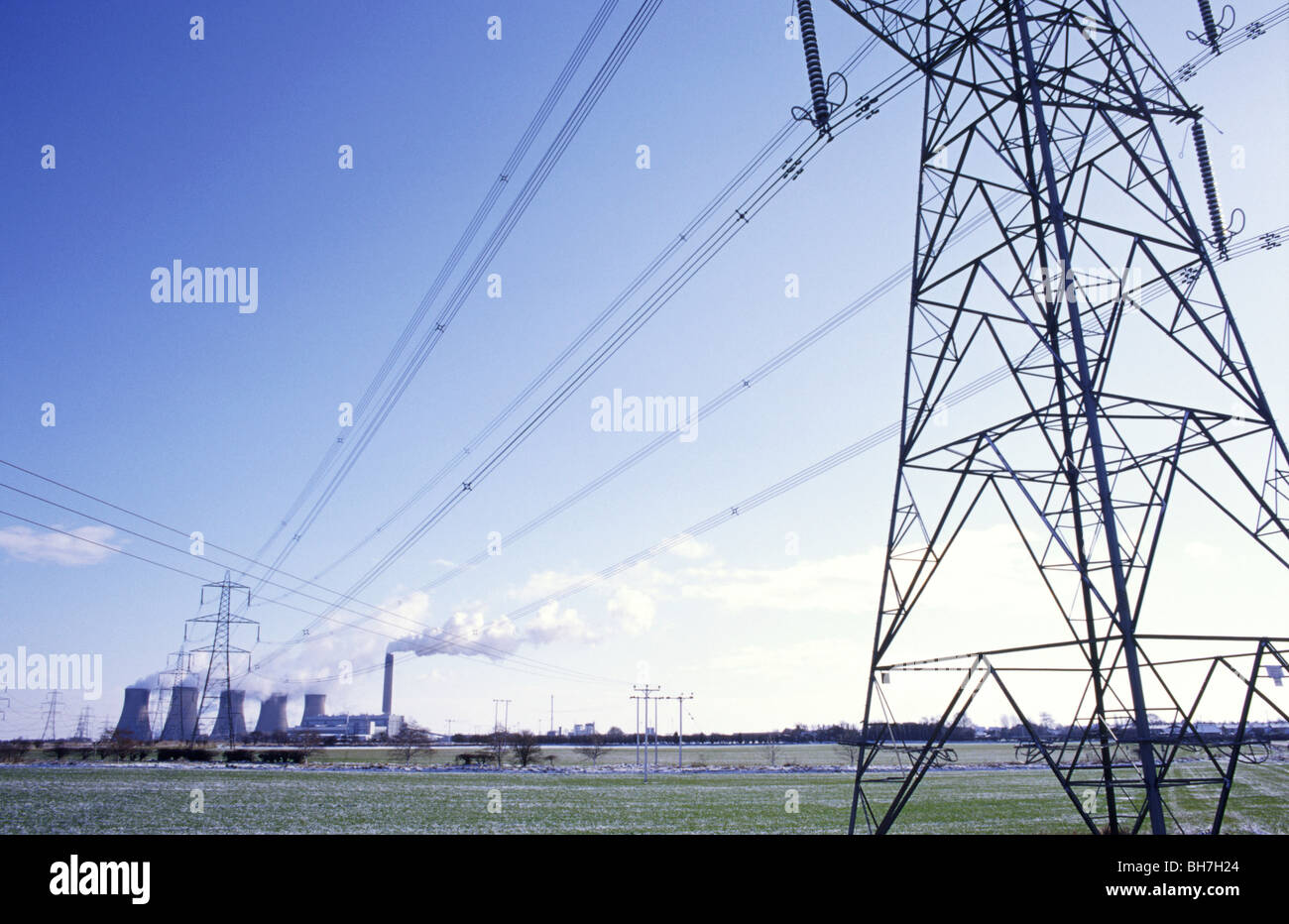 Pylons and power station Stock Photo - Alamy