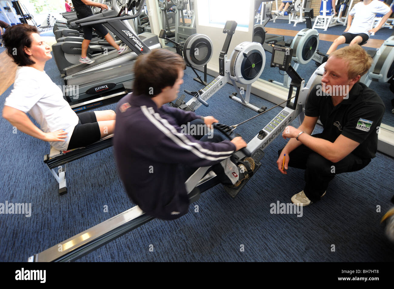 A young man with learning disabilities works out in a gym, North ...