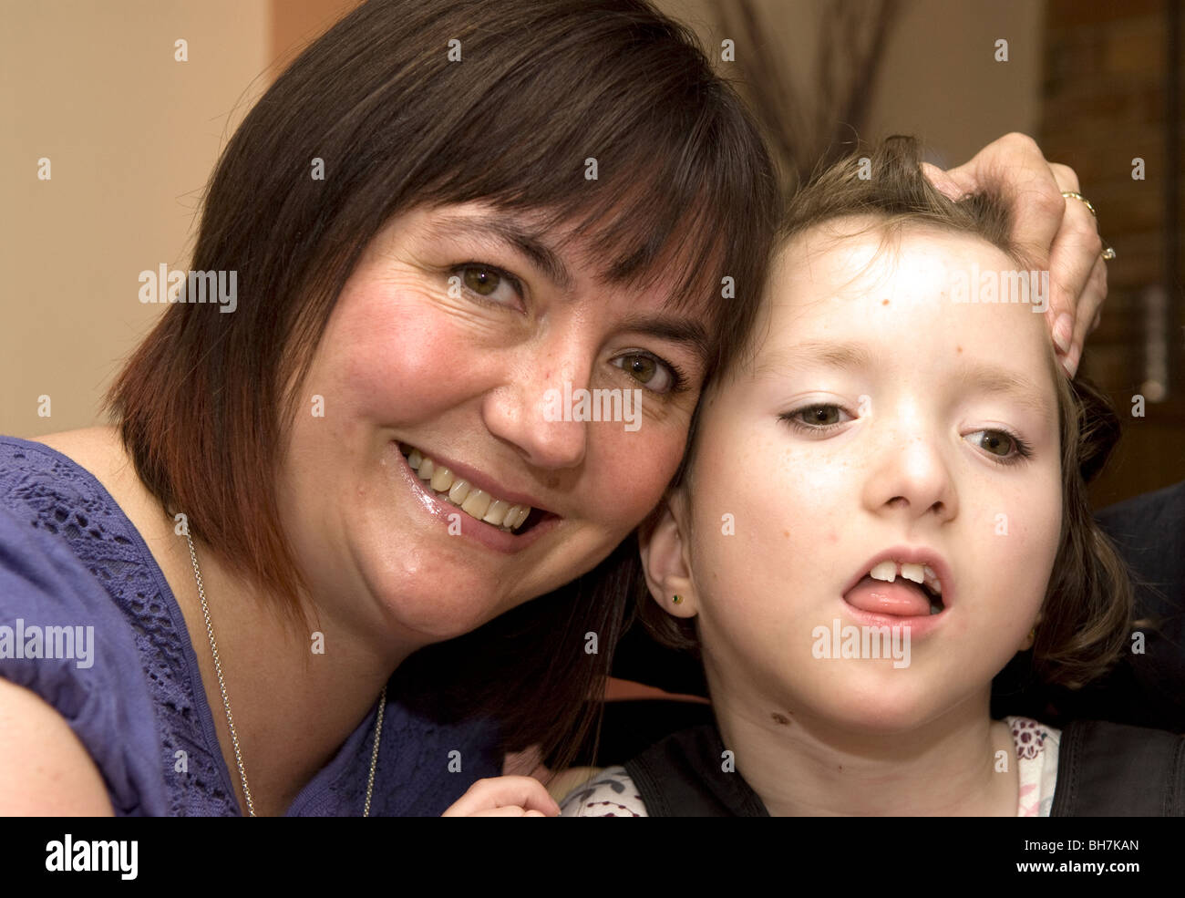 Mother with disabled daughter (cerebral palsy), Luton, UK Stock Photo ...