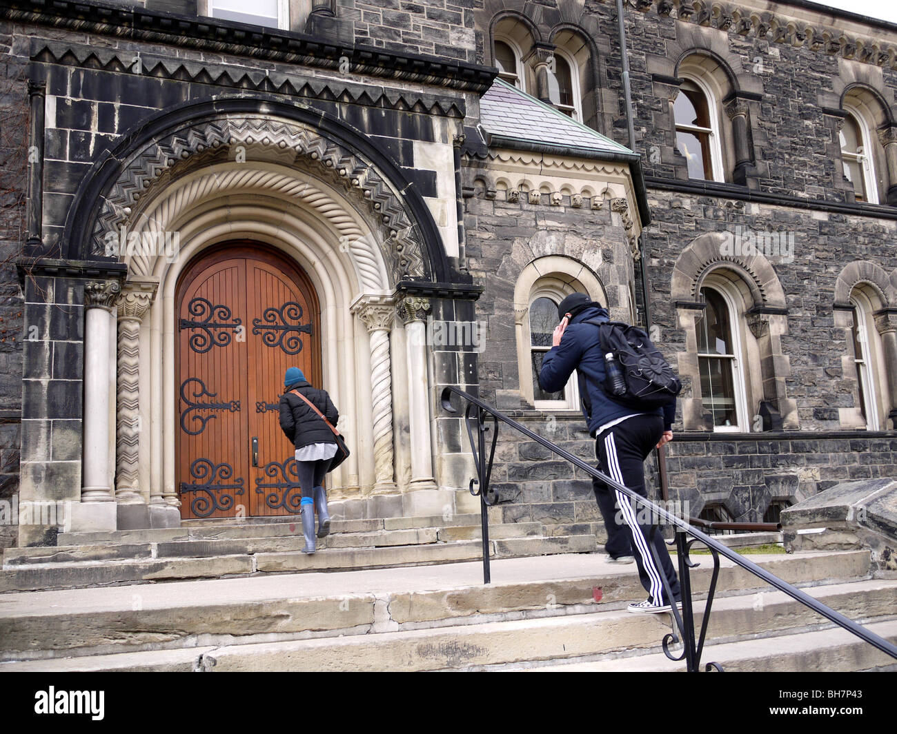 Students entering college building Stock Photo - Alamy