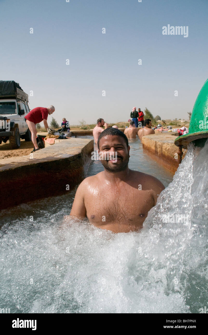Egyptians bathing at Bir Sitta, a remote thermal hot spring located in ...