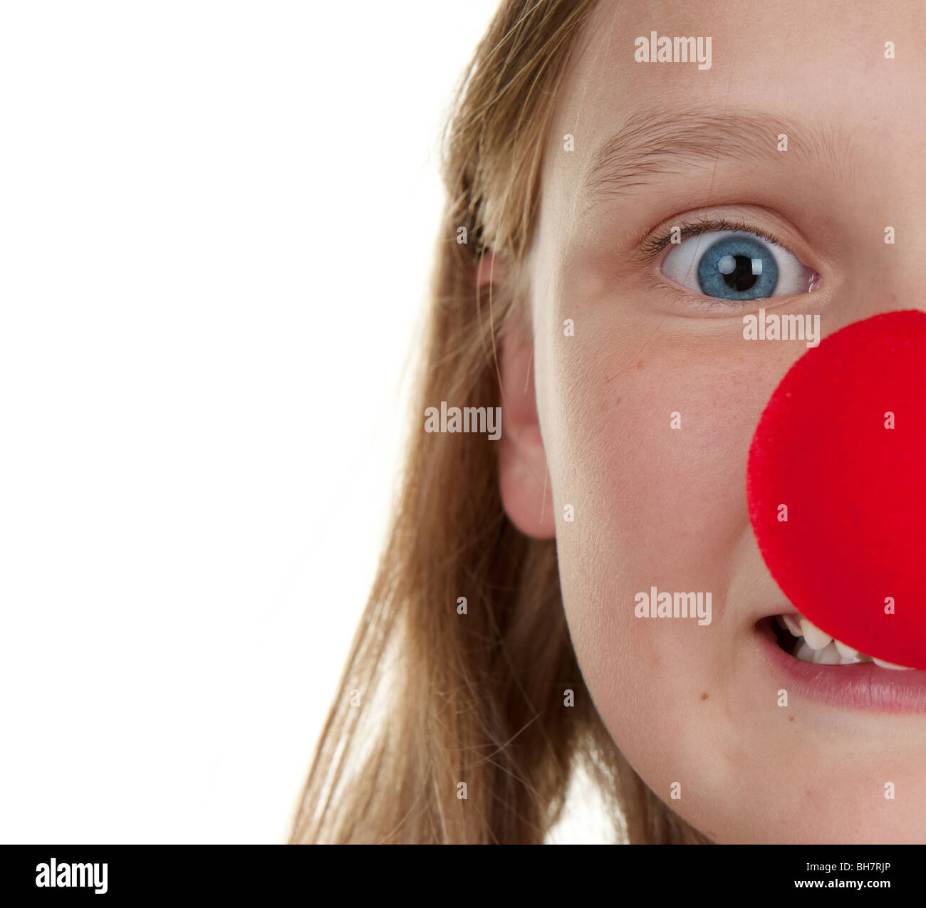 young girl with a red nose Stock Photo - Alamy