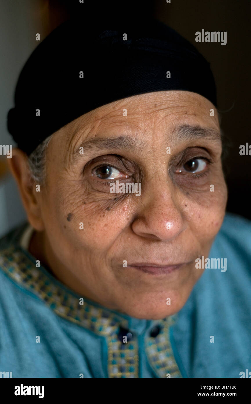 A portrait of a middle aged working class Arab Muslim Egyptian woman ...