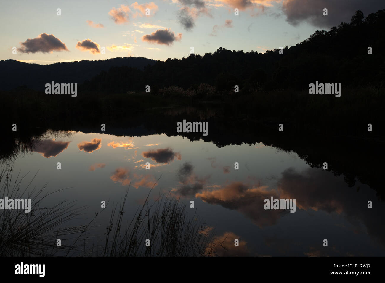 Cloud Reflections at Mokau River mouth, a popular trout fishery, Lake ...