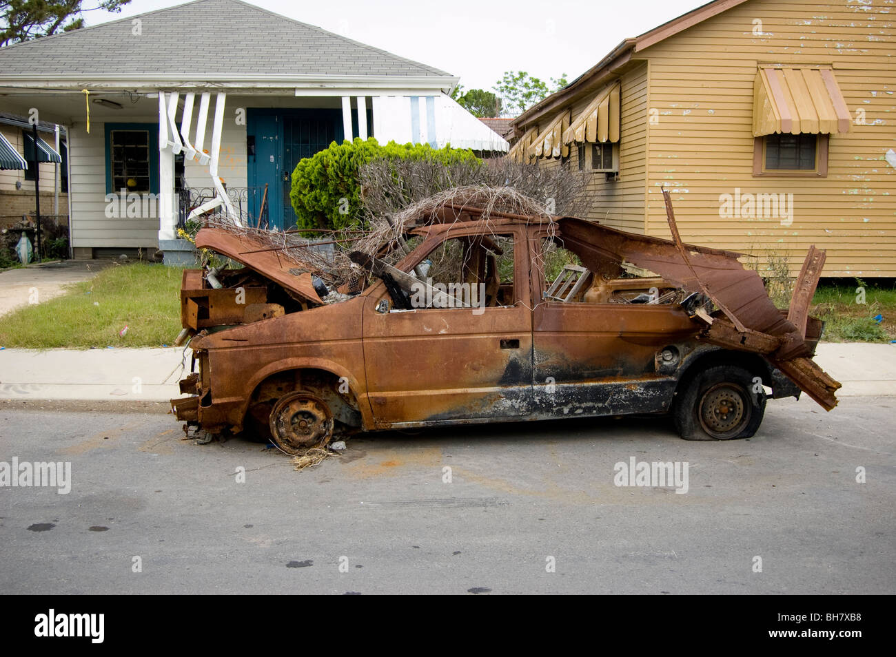 A rusty minivan site in front of two homes in the Lower Ninth Ward, New ...