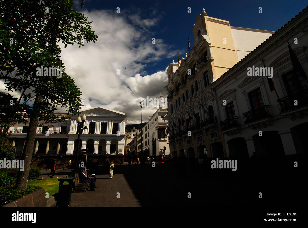 Ecuador, Quito, People walking in front of Quito's Cathedrol and taxis ...