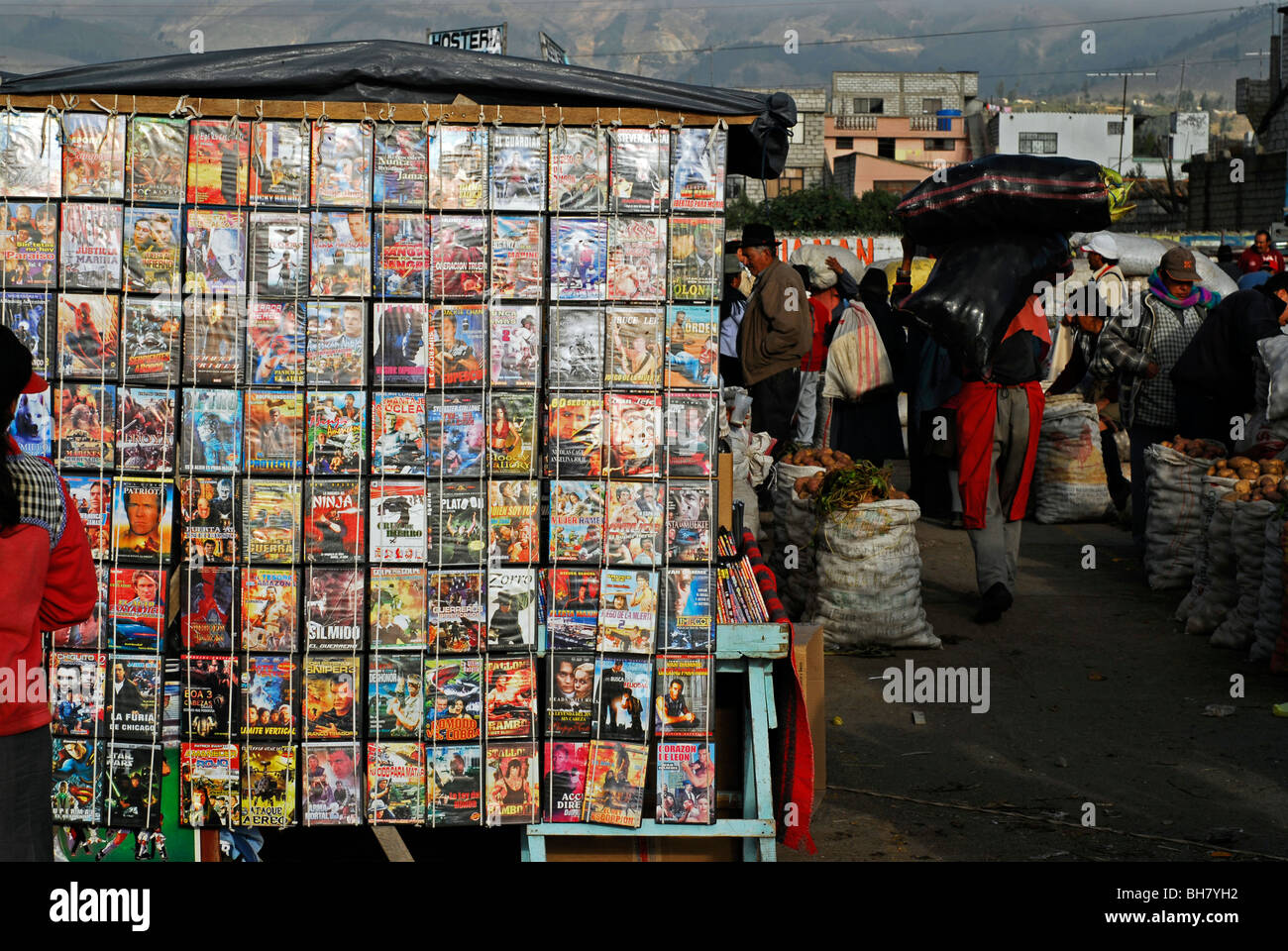 Ecuador, Saquisili, view of DVDs displayed at a market stall with ...