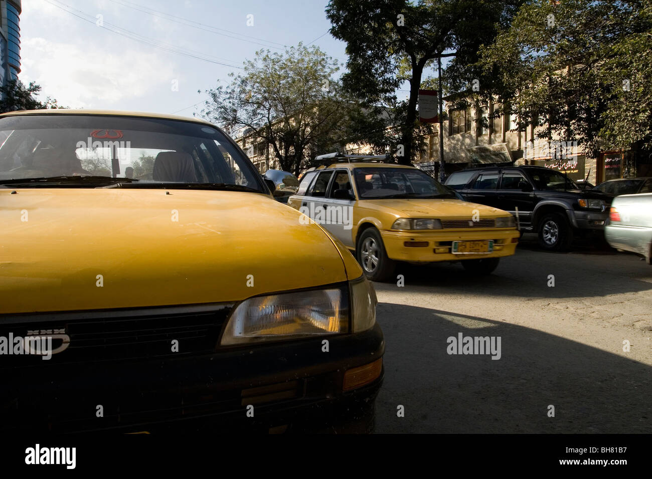 taxi cabs driving through the streets of Kabul Afghanistan Stock Photo ...