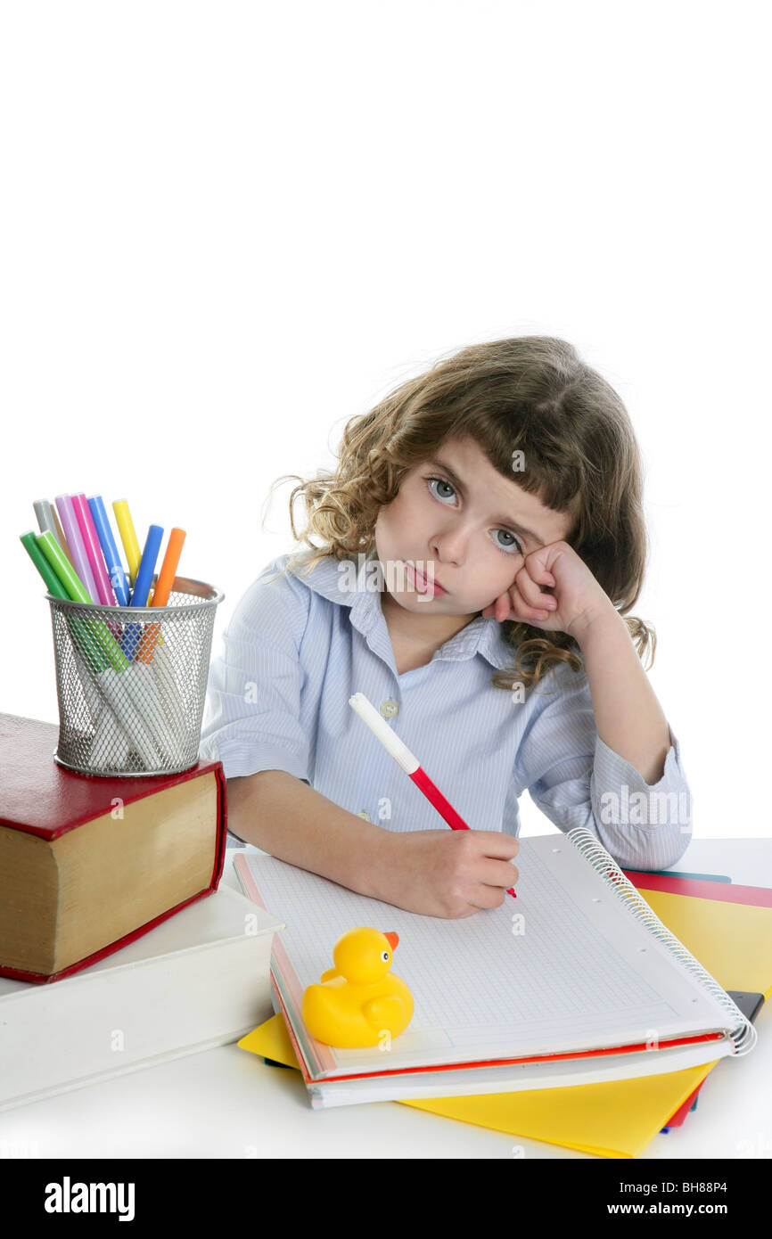 Bored student little girl isolated on white background Stock Photo - Alamy