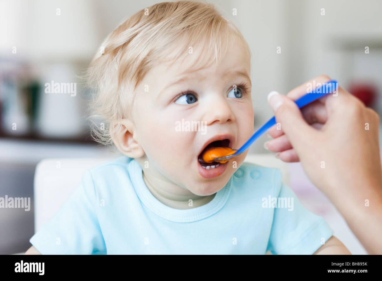 baby being fed Stock Photo - Alamy