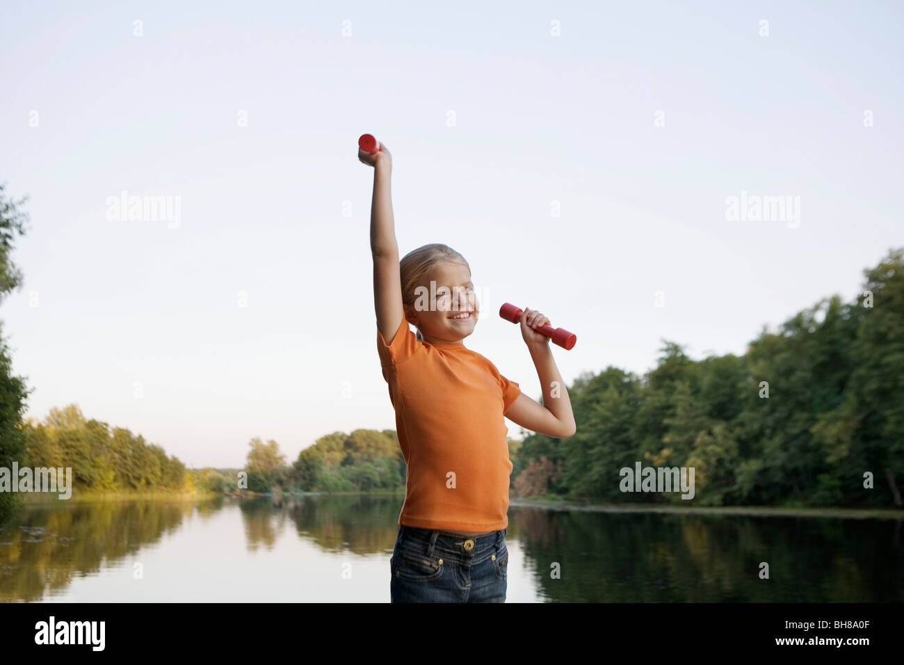 Lifting weights child hi-res stock photography and images - Alamy