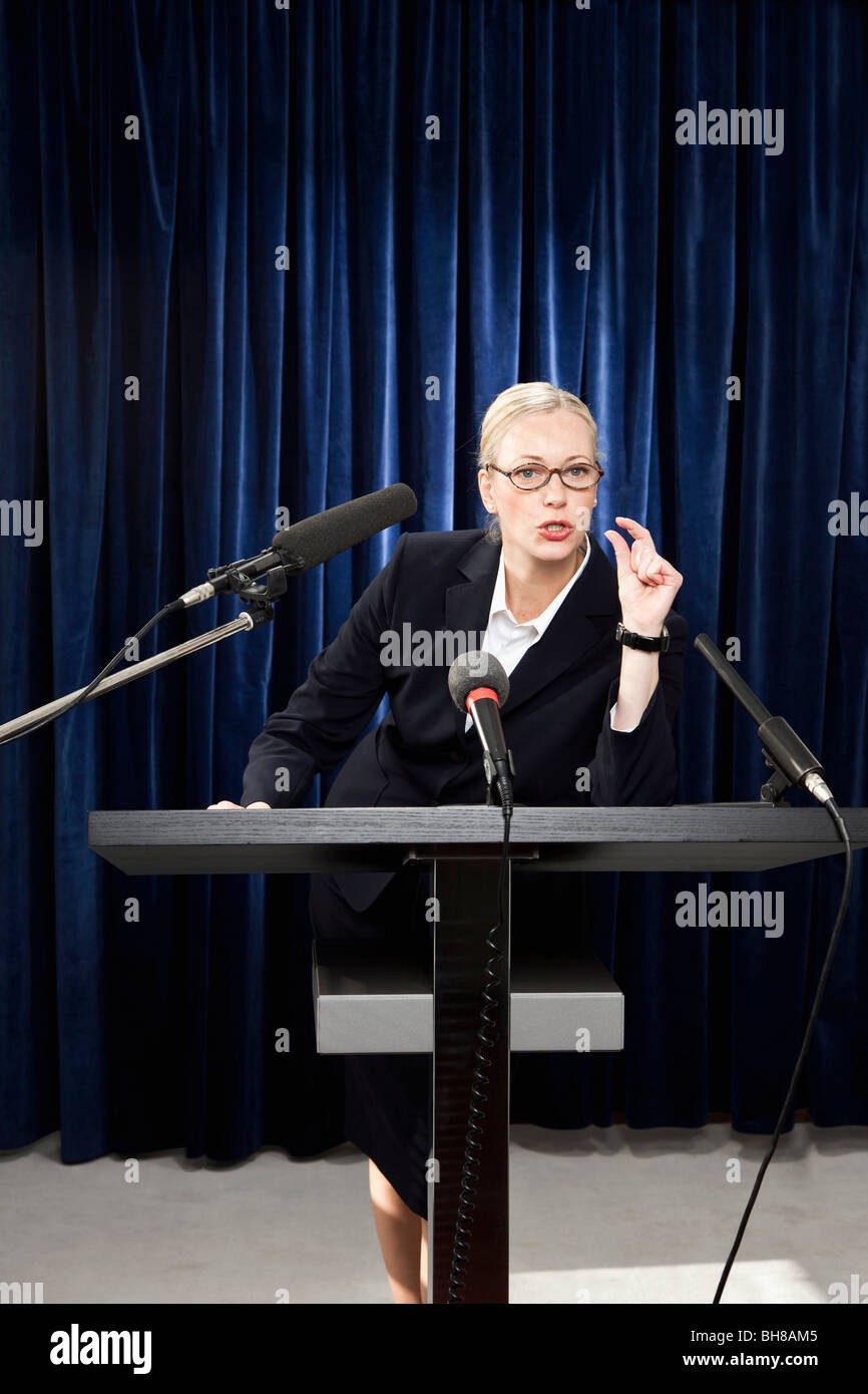 Woman stage speaking business conference hi-res stock photography and ...