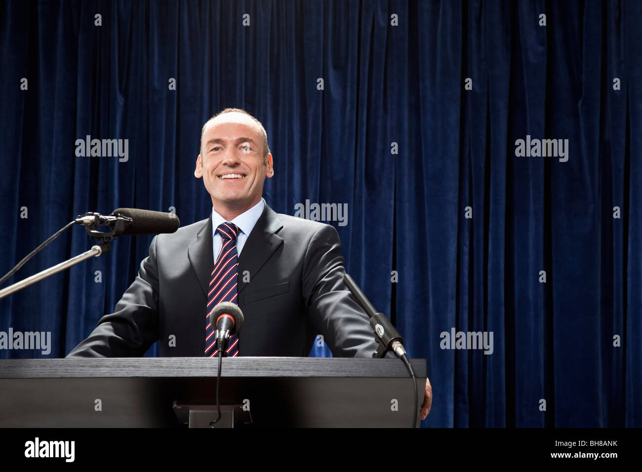 Standing smiling confidence politician hi-res stock photography and ...