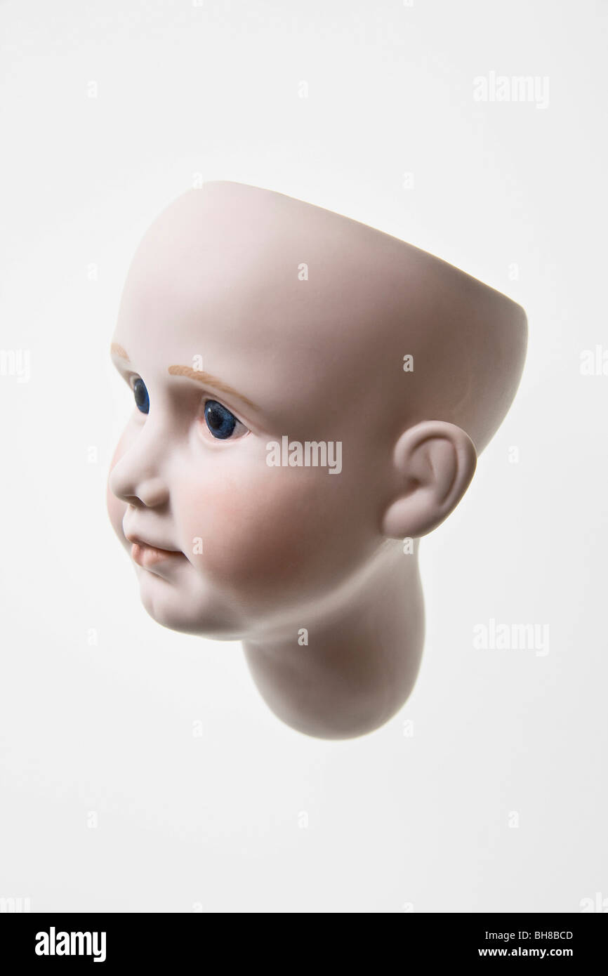 Side view of the head of a doll Stock Photo - Alamy