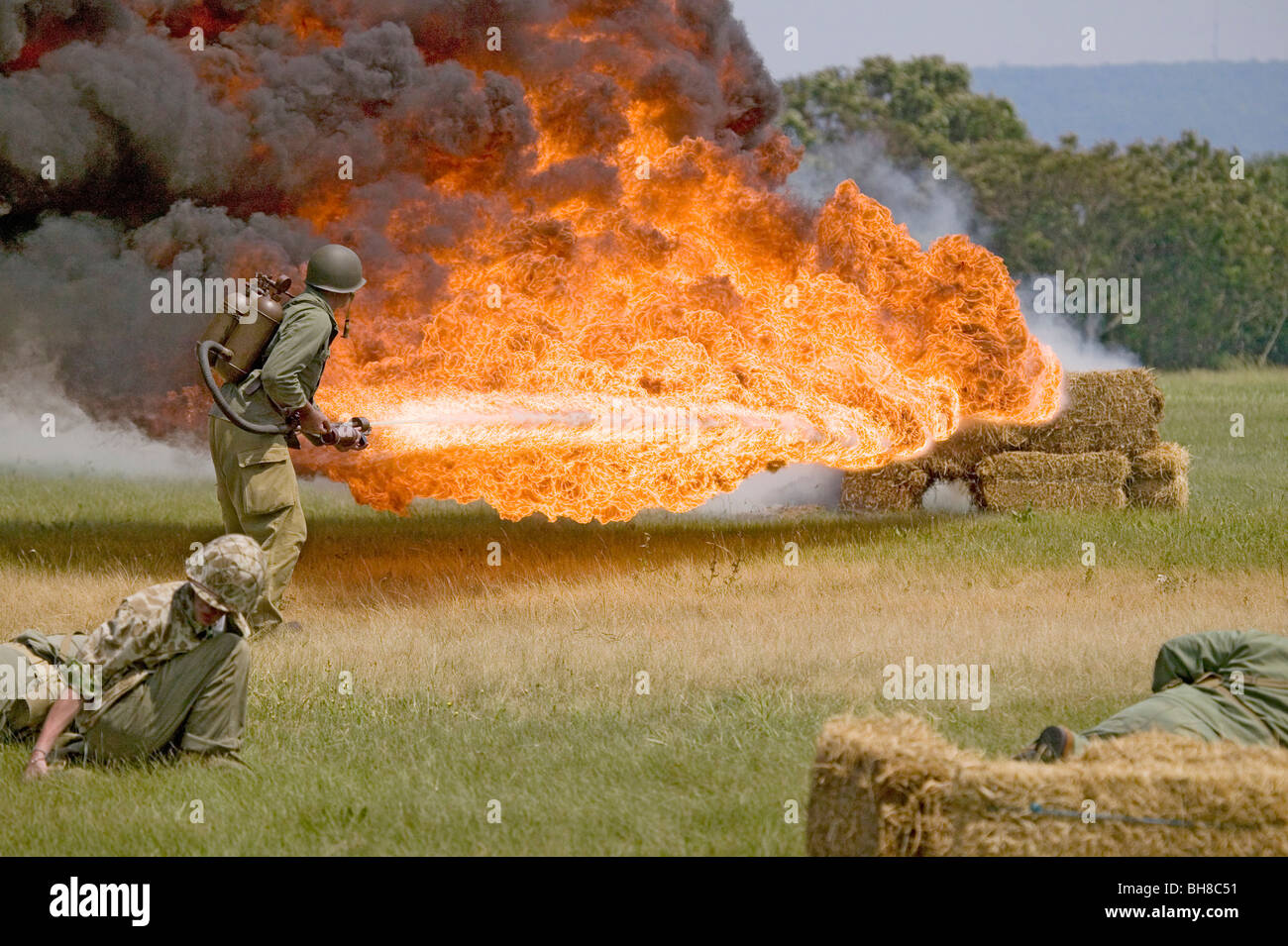 World War II reenactment of a battle between American infantryman and ...