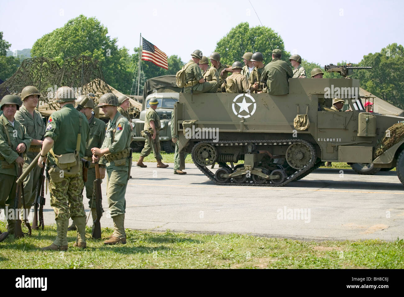 World War II reenactment of a battle between American infantryman and ...