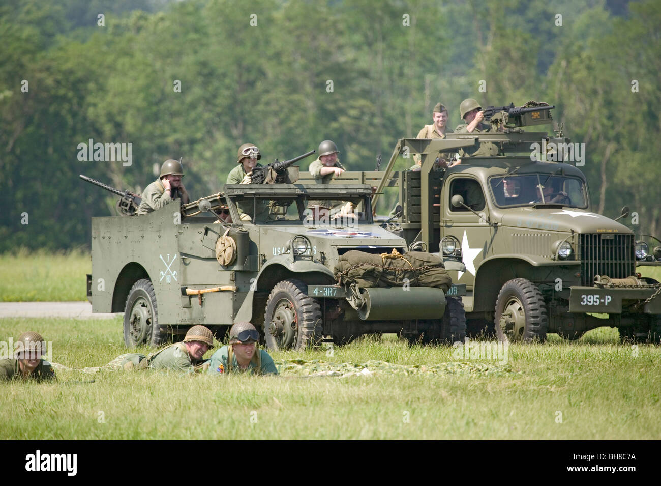 World War II reenactment of a battle between American infantryman and ...