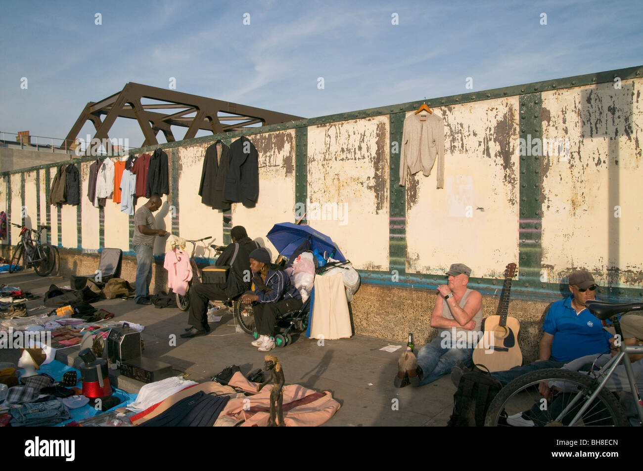 UK.People selling and bartering clothes and goods at Sunday market in ...