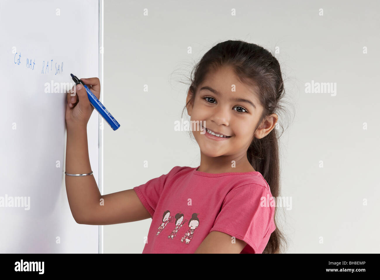 Indian children writing hi-res stock photography and images - Alamy