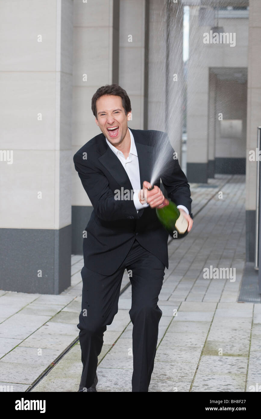 Celebrating spraying champagne hi-res stock photography and images - Alamy
