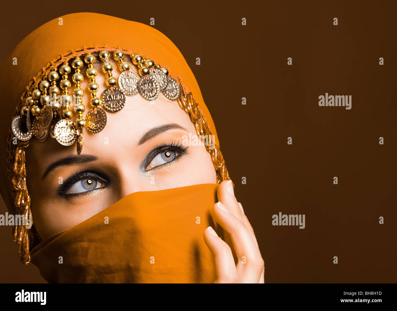 A young beauty wearing a red veil hi-res stock photography and images ...
