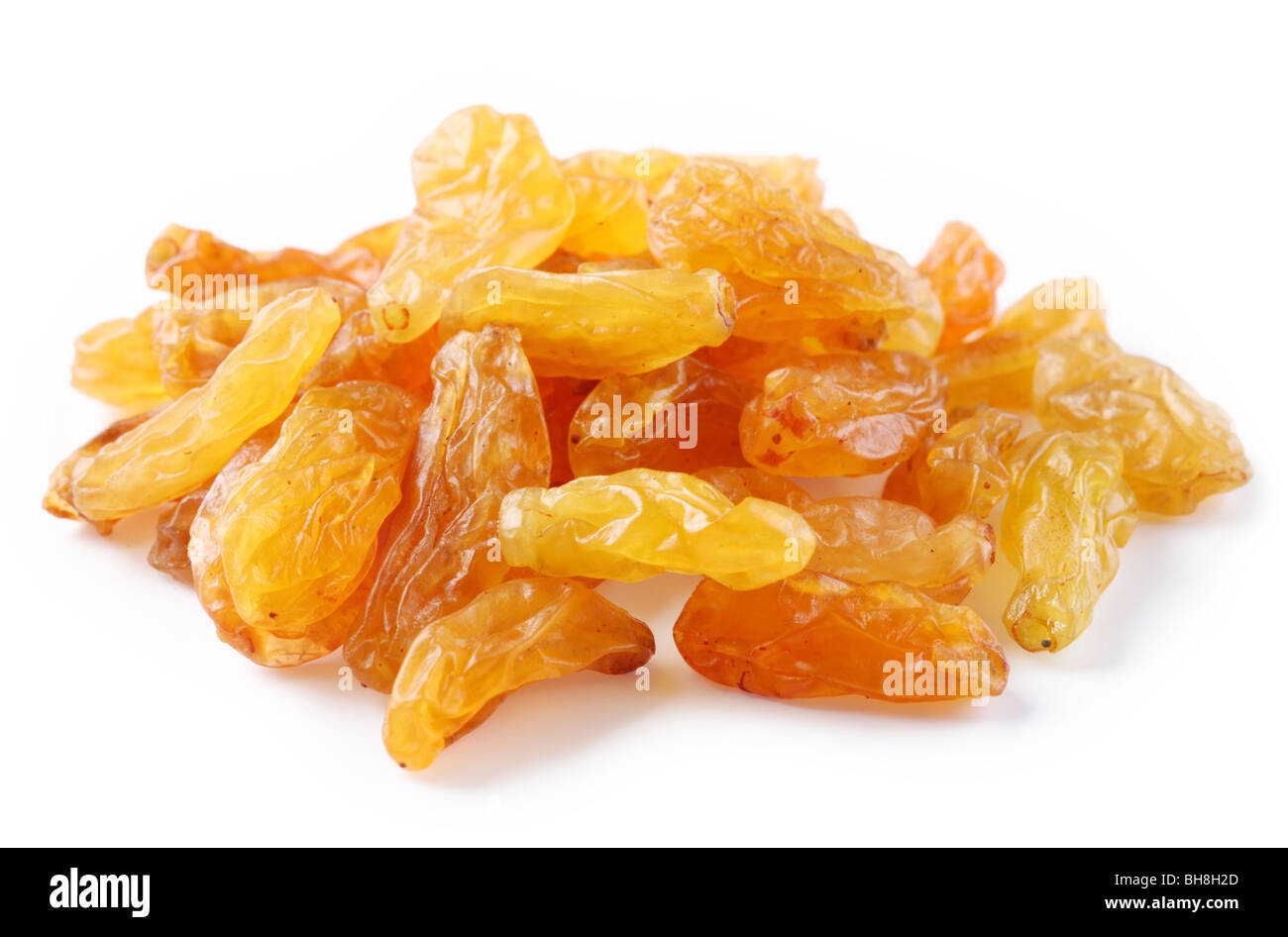 White raisins on a white background Stock Photo - Alamy