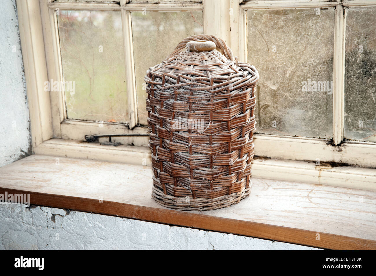 Whicker flour storage basket Stock Photo - Alamy