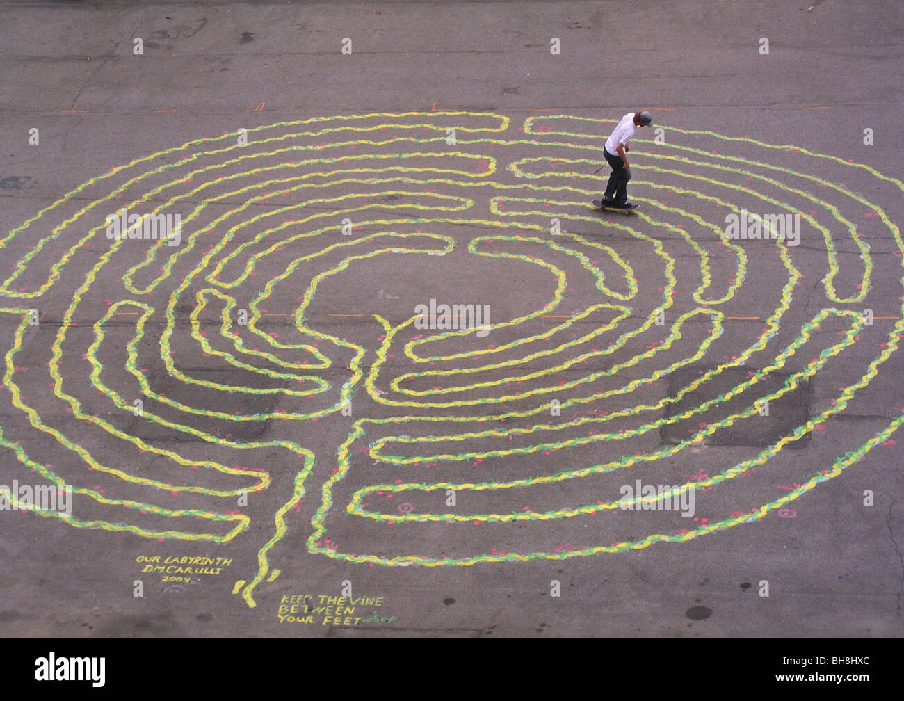Skateboarding in maze Stock Photo - Alamy