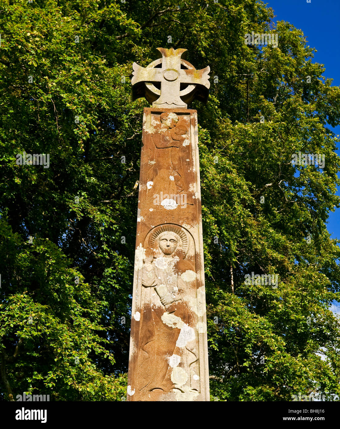 Stone cross in the village of Wreay in Cumbria England designed by Sara ...