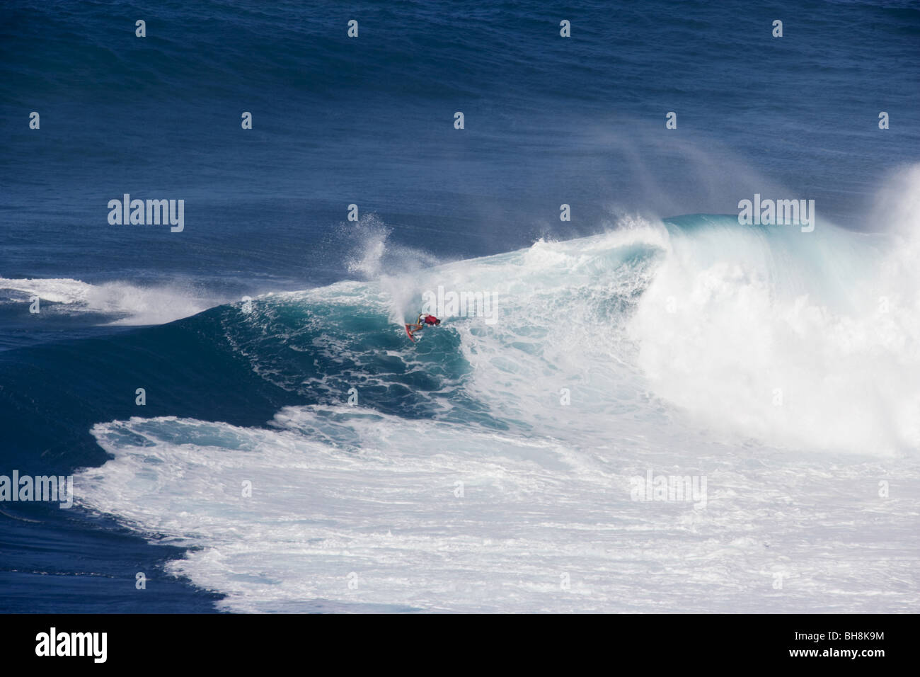 Surfing at Jaws; Maui , Hawaii Stock Photo - Alamy