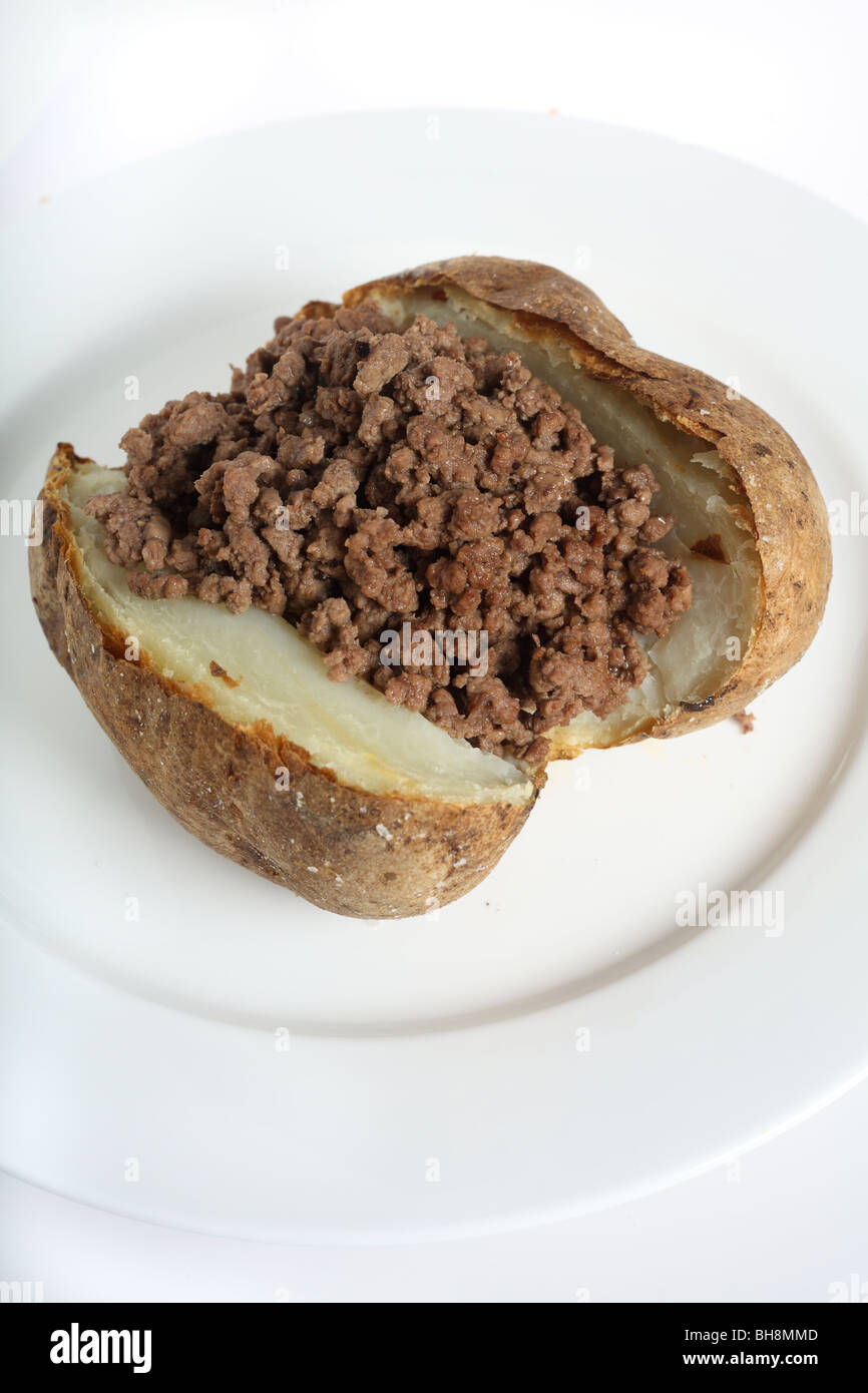 Baked jacket potato with minced beef hi-res stock photography and ...