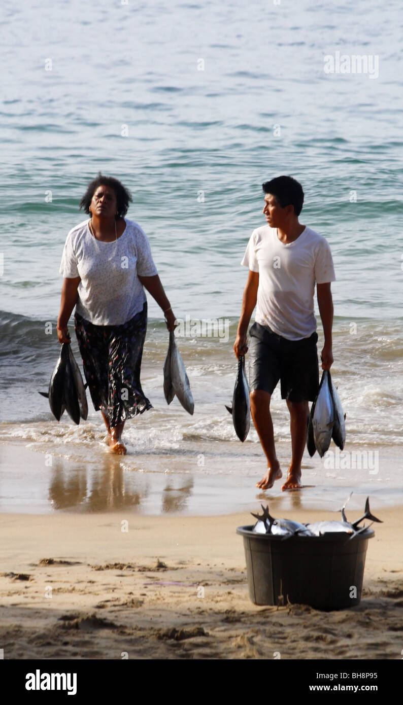 Fish Ladies on beach Escondido Oaxaca Mexico Stock Photo - Alamy