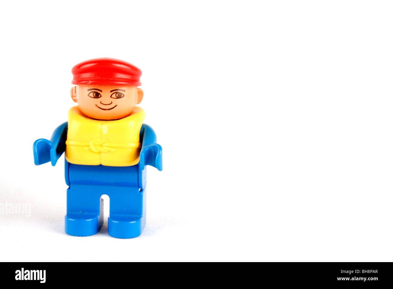 Duplo man on a white studio background Stock Photo - Alamy